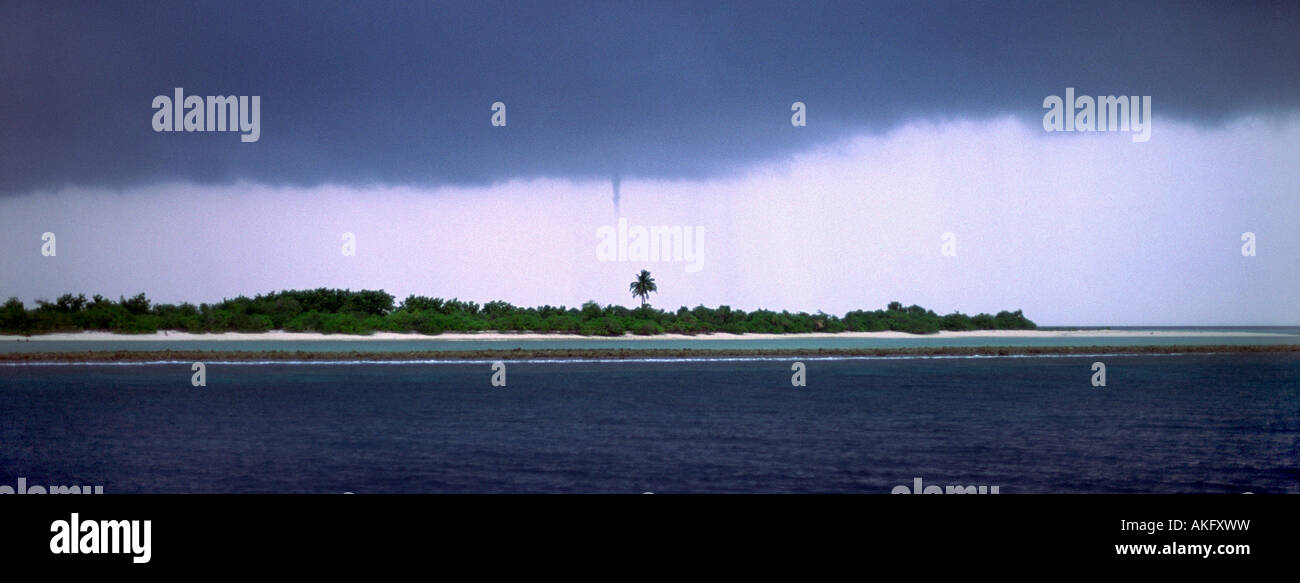 Approaching storm with mini tornado. Ari Atoll, Maldives Stock Photo ...