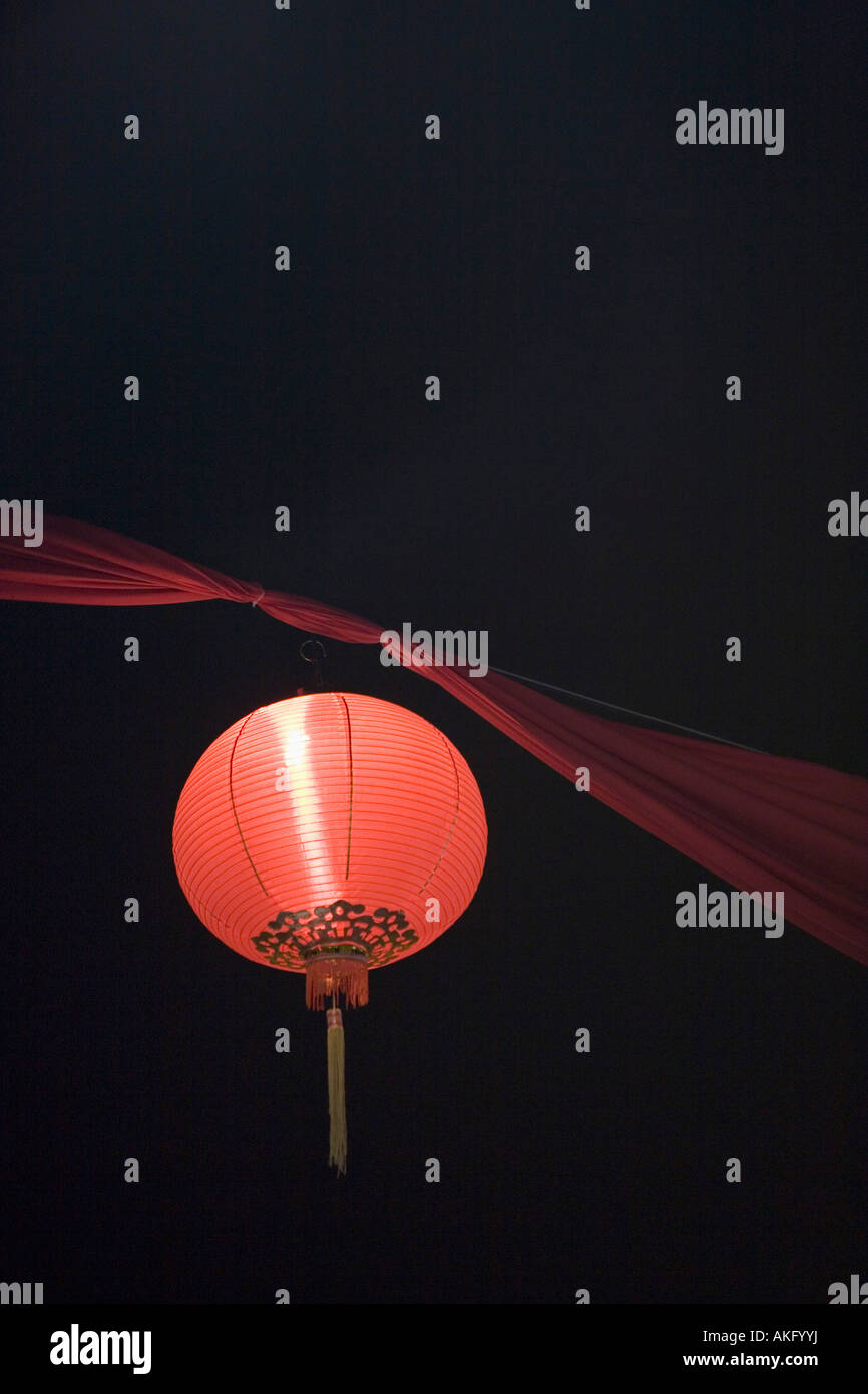 Low angle view of a Chinese lantern lit up at night Stock Photo - Alamy