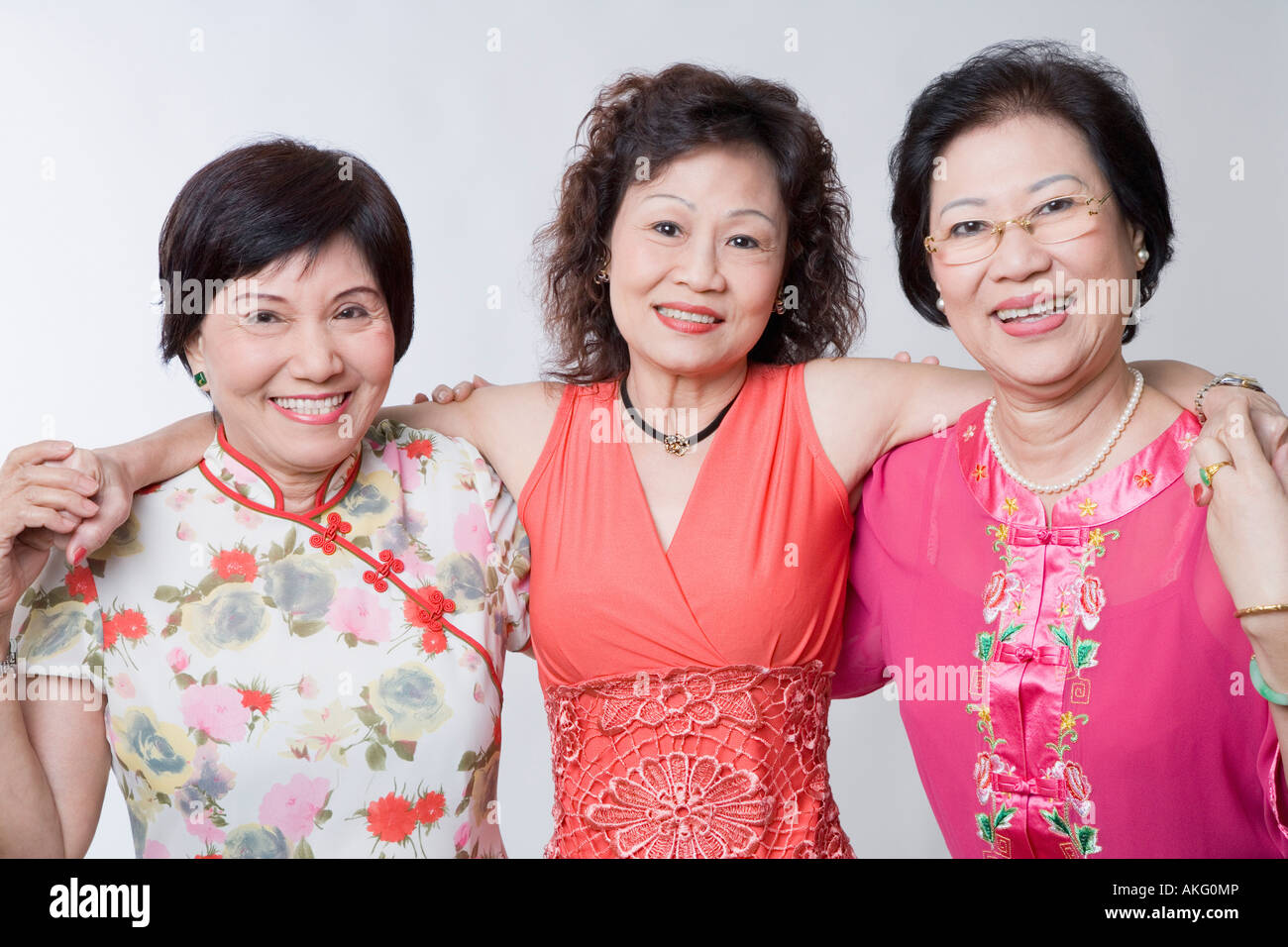 Portrait of three senior women standing together and smiling Stock ...