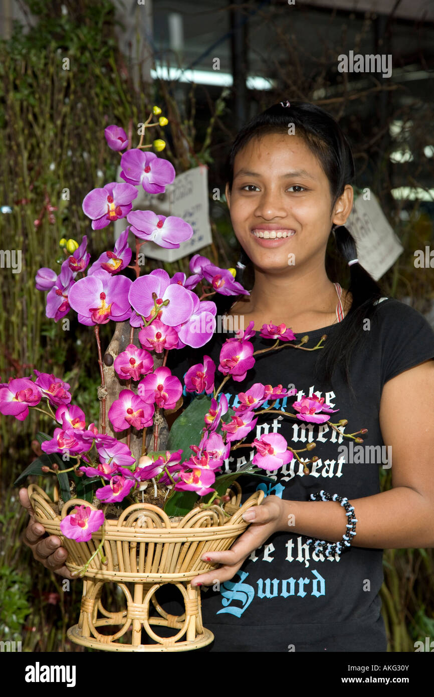Asian Female Orchid Flower Seller. Florist in Street Market Chiang Mai ...