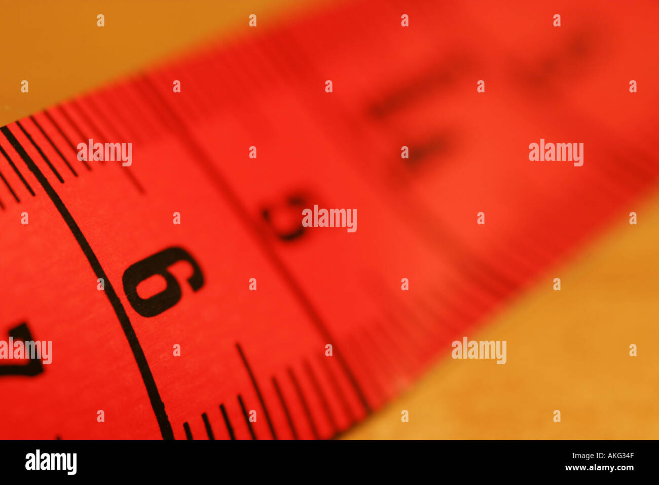 Tape measure close up red colour Stock Photo - Alamy