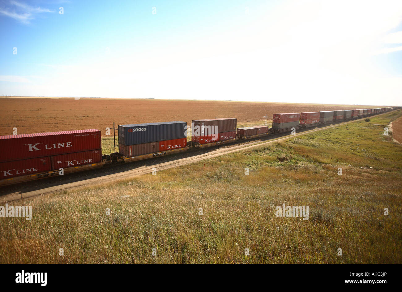 Train cars approaching a Saskatchewan underpass Stock Photo - Alamy