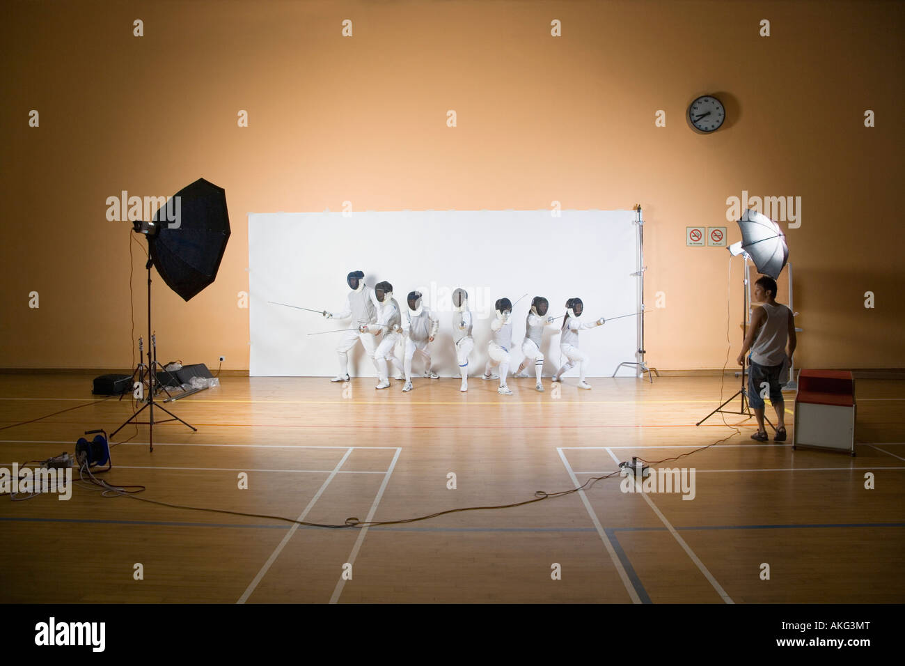 Group of people fencing Stock Photo - Alamy