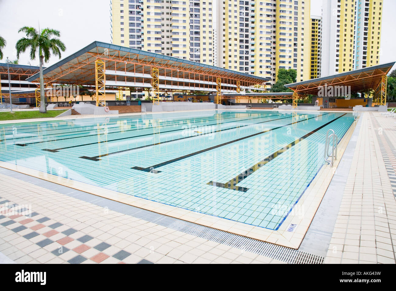 Swimming pool in front of buildings, Clementi Swimming Complex ...