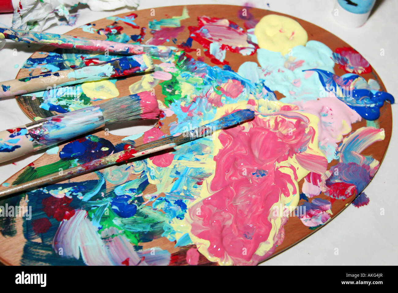 painter pallette with many mixed colors Stock Photo - Alamy