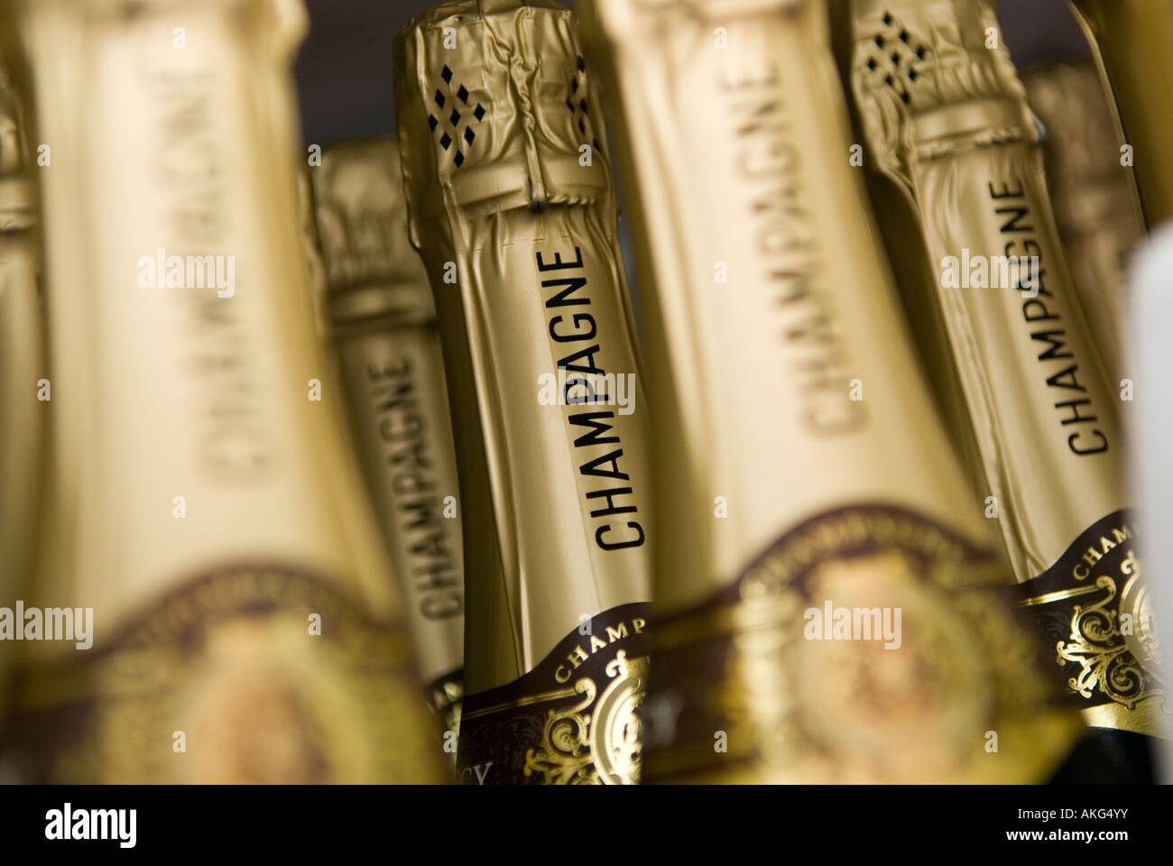 Close up of champagne bottle necks Stock Photo - Alamy