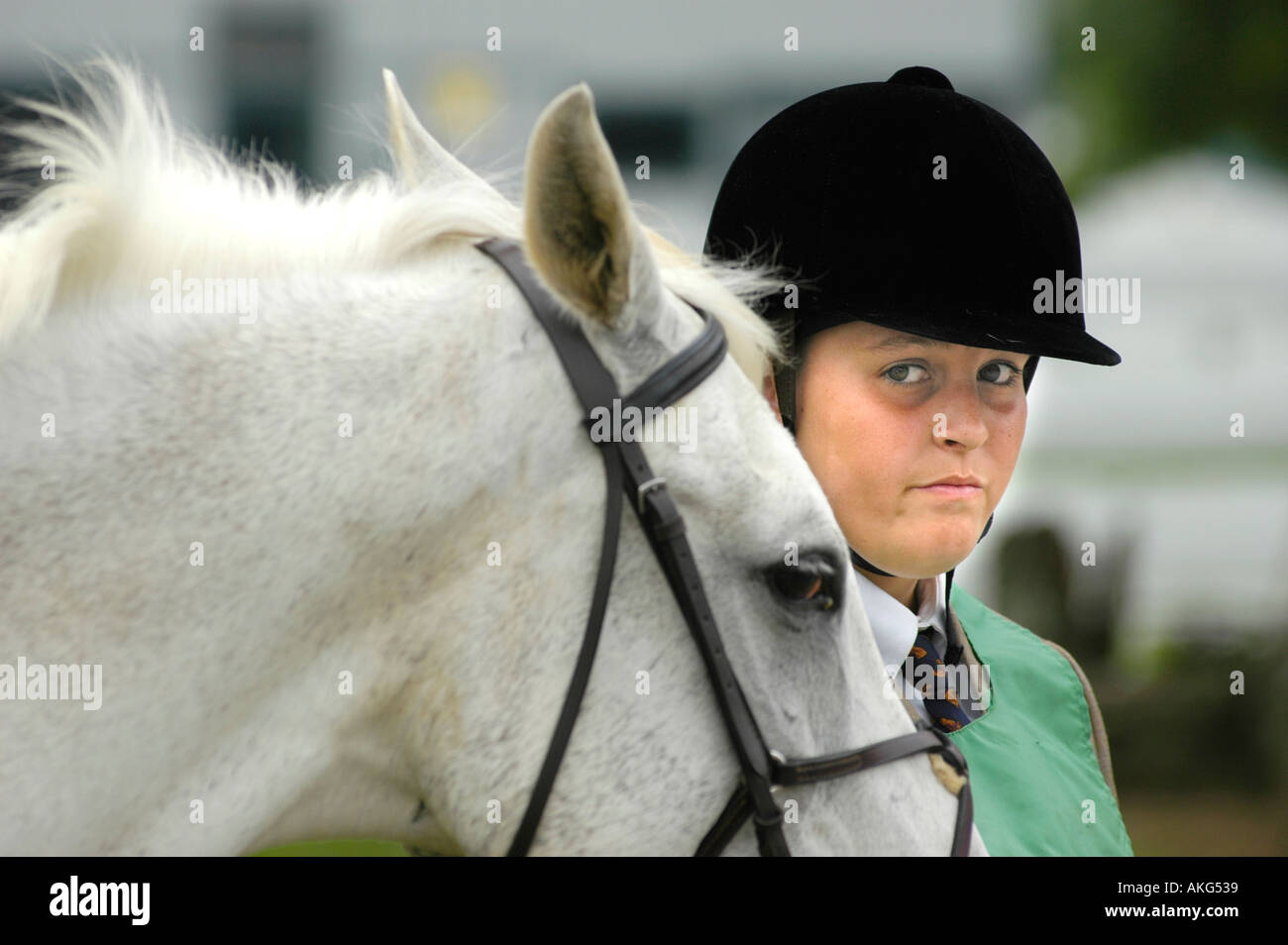 Girl riders and horses at Equestrian event Stock Photo - Alamy