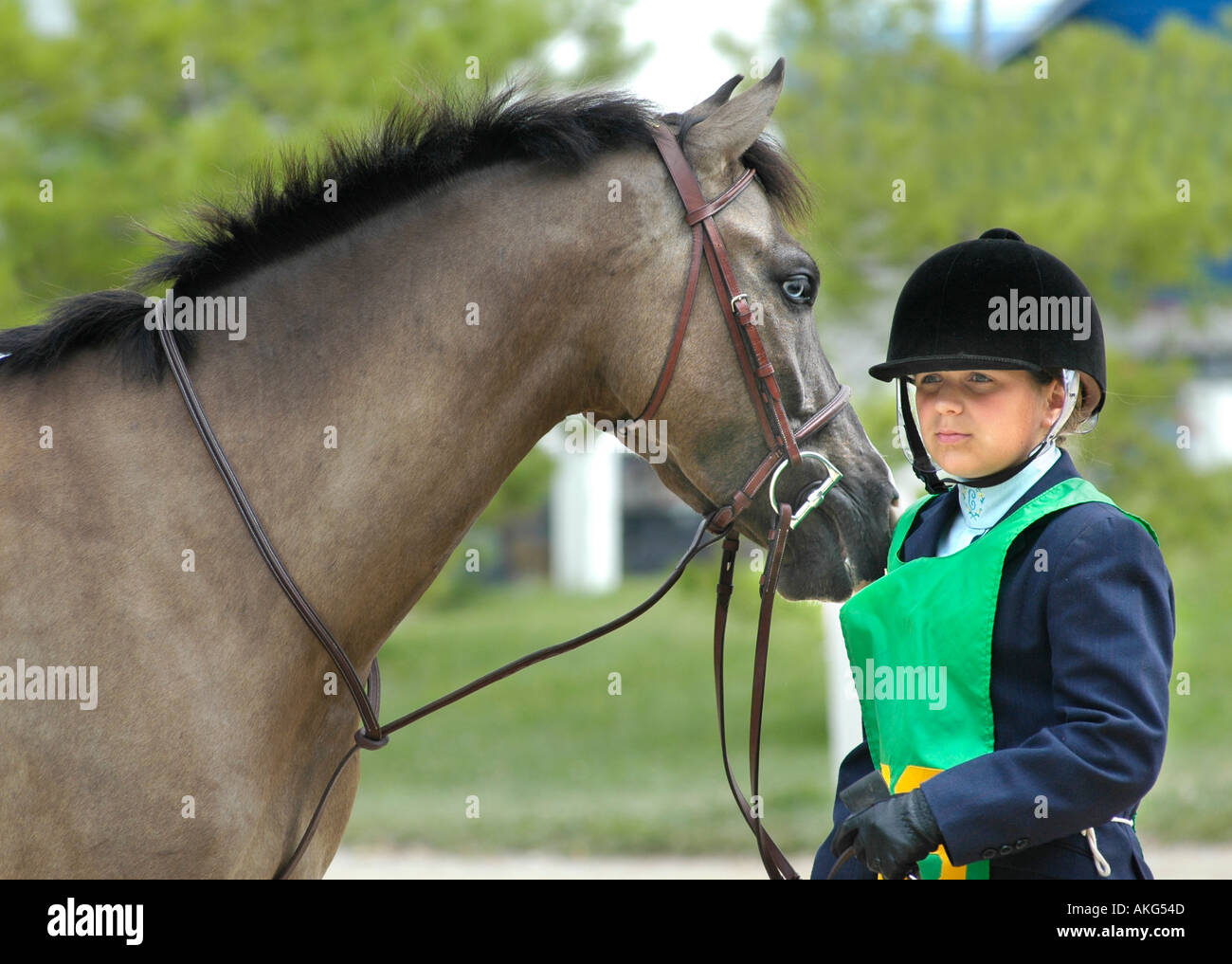 Girl riders and horses at Equestrian event Stock Photo - Alamy