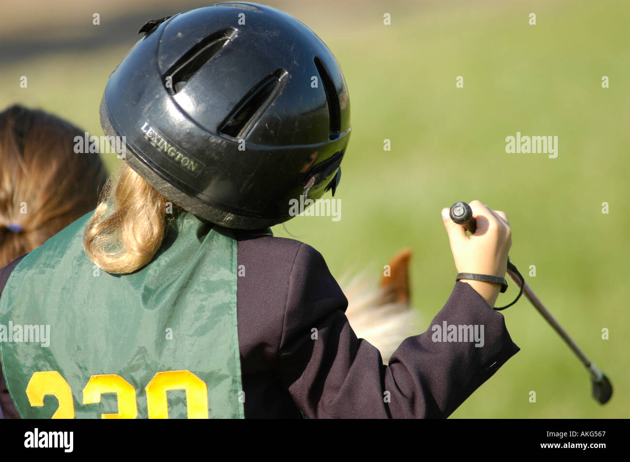 Girl riders and horses at Equestrian event Stock Photo - Alamy