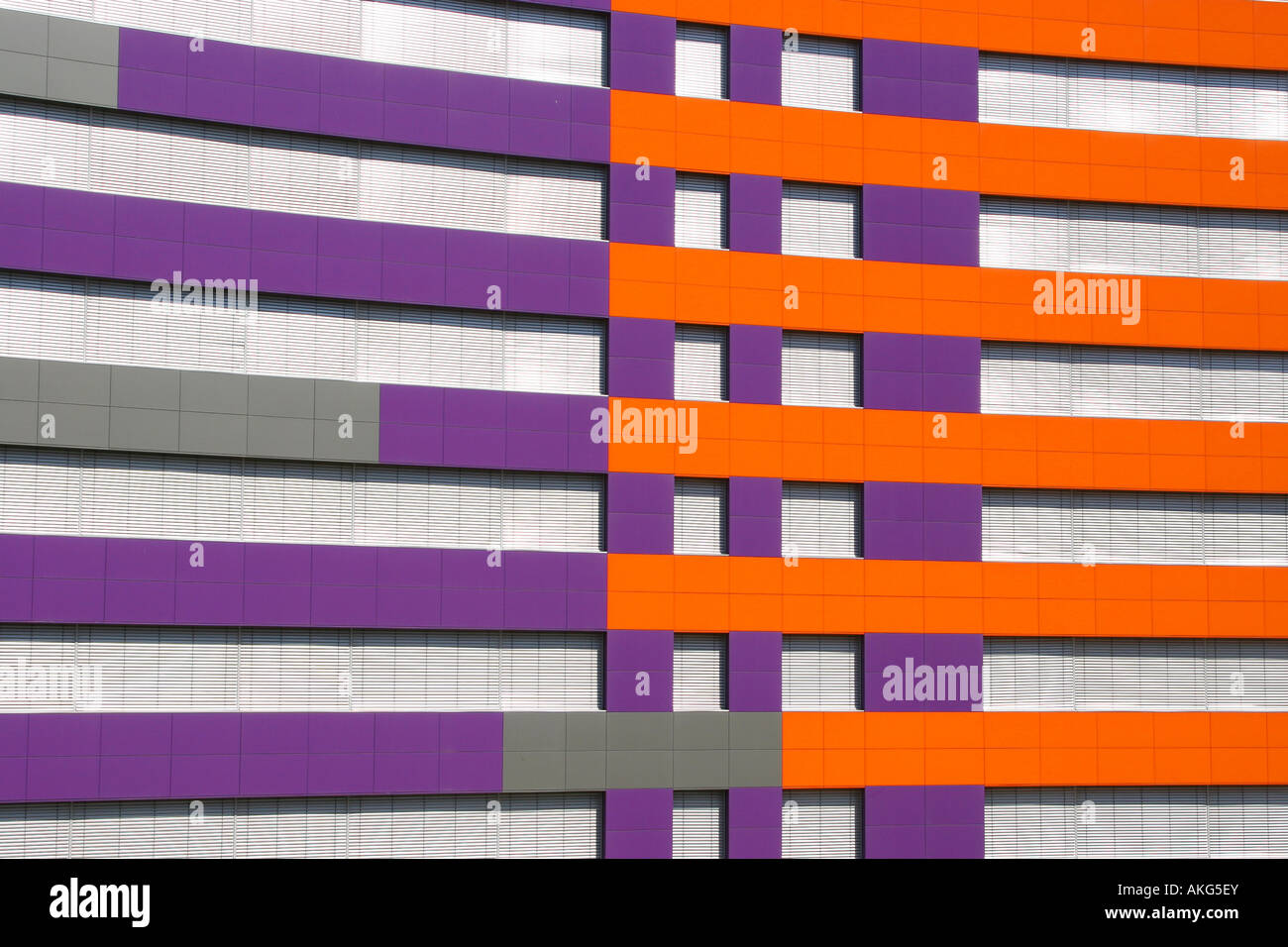 purple and orange office building Stock Photo - Alamy