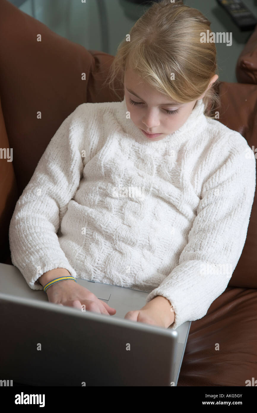 Child working on a laptop Stock Photo - Alamy