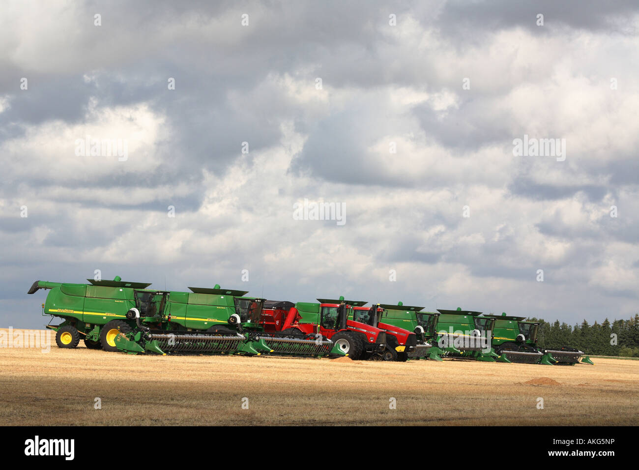 Combines lined up in a Saskatchewan field Stock Photo - Alamy