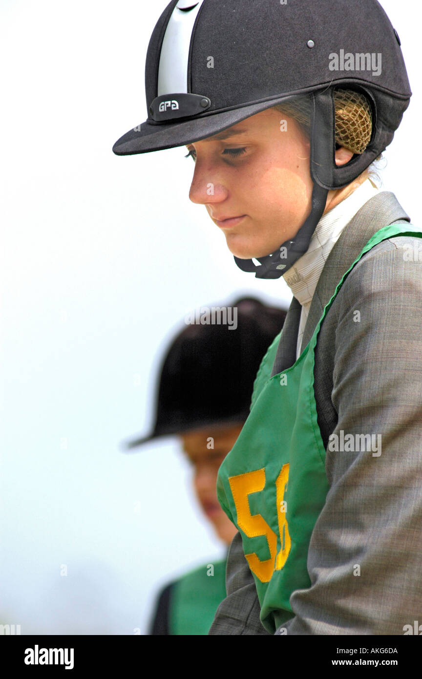 Girl riders and horses at Equestrian event Stock Photo - Alamy