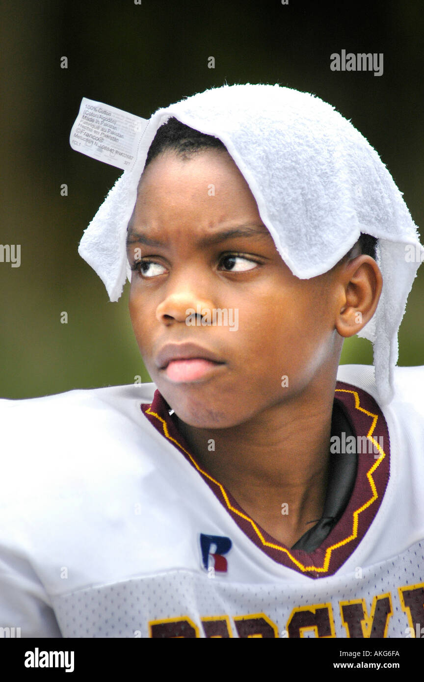Kids football practice for full contact sport Stock Photo - Alamy