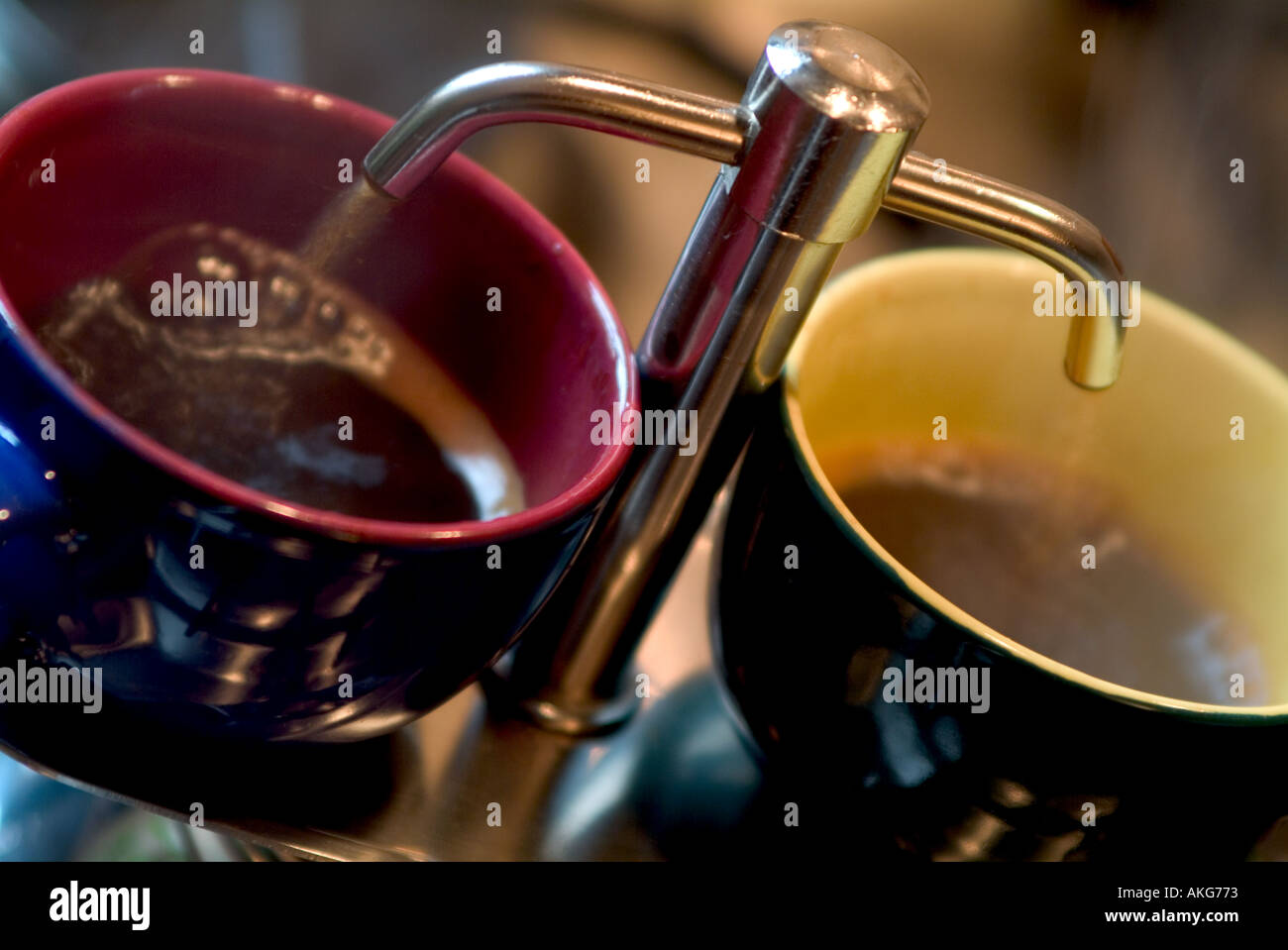 coffee for two made with a modern steel coffeepot Stock Photo - Alamy