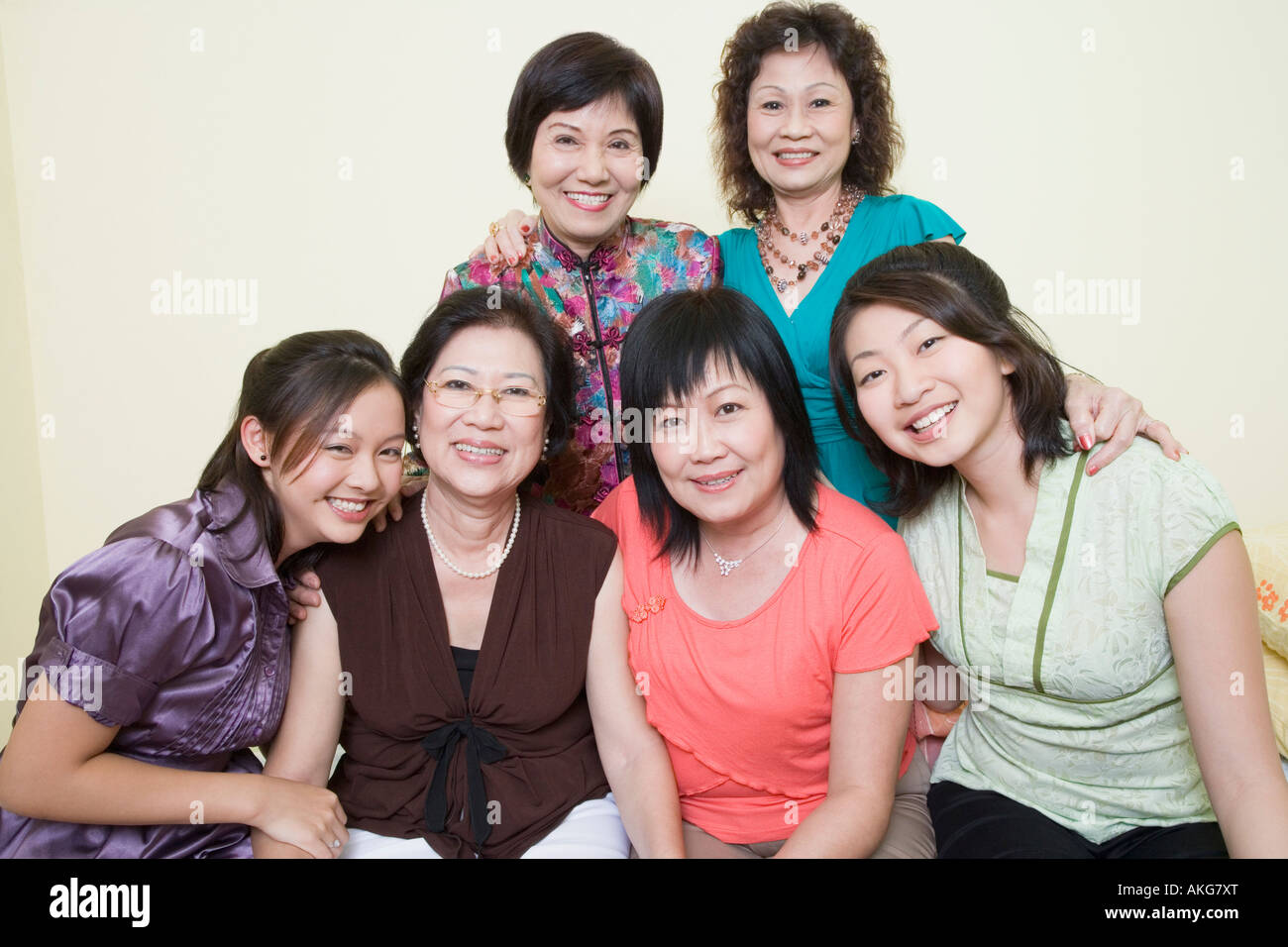 Portrait of a group of women posing and smiling Stock Photo - Alamy