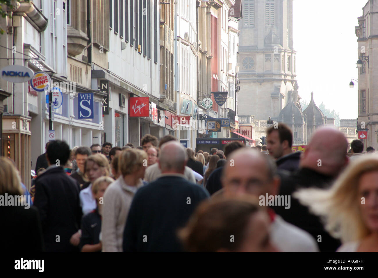 shoppers in a busy town centre high street Stock Photo - Alamy