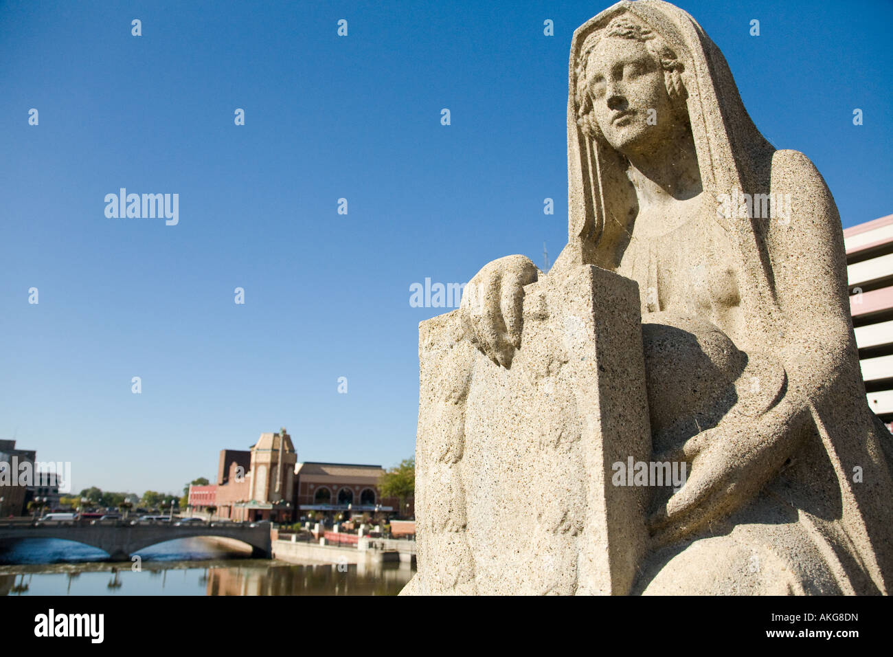 ILLINOIS Aurora Stone statue of woman on bridge over Fox River ...