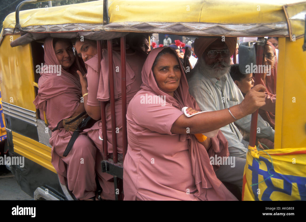 Women sitting in a auto rickshaw India Stock Photo - Alamy