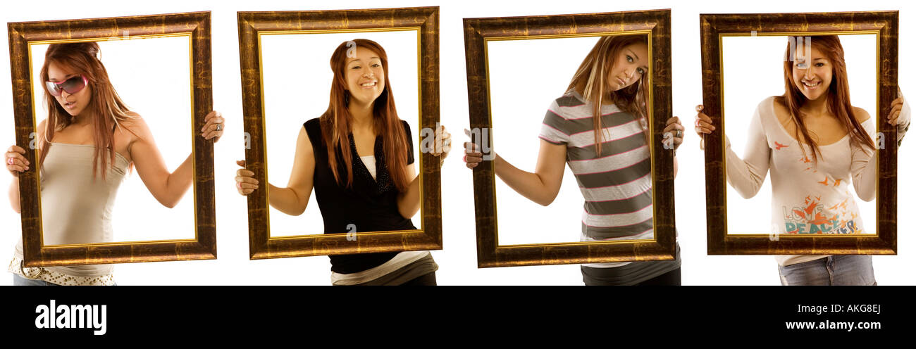 Women posing with a picture frame Stock Photo - Alamy