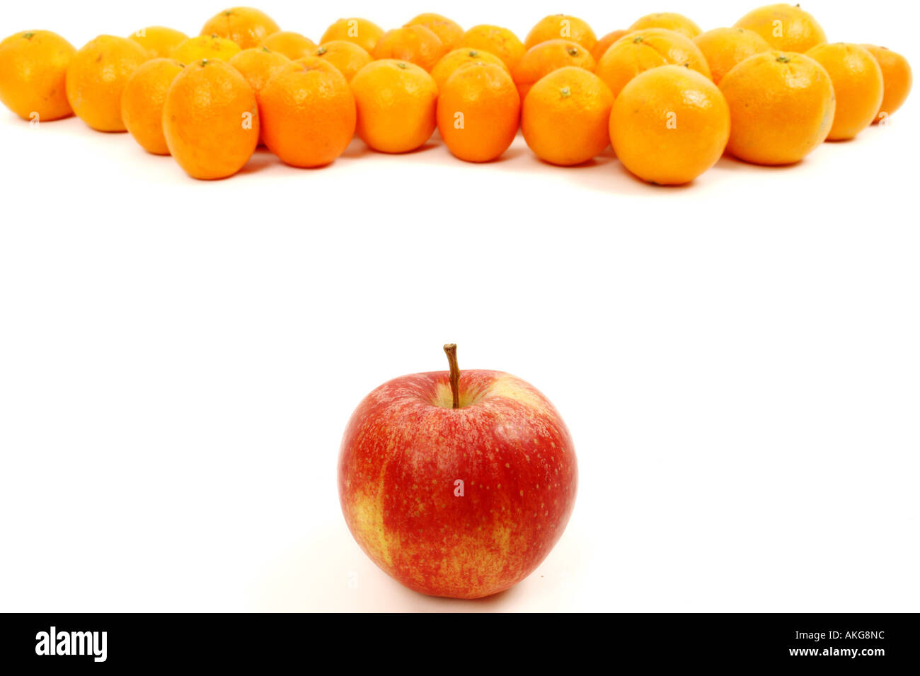 apple and oranges arranged to symbolize leadership teamwork network ...