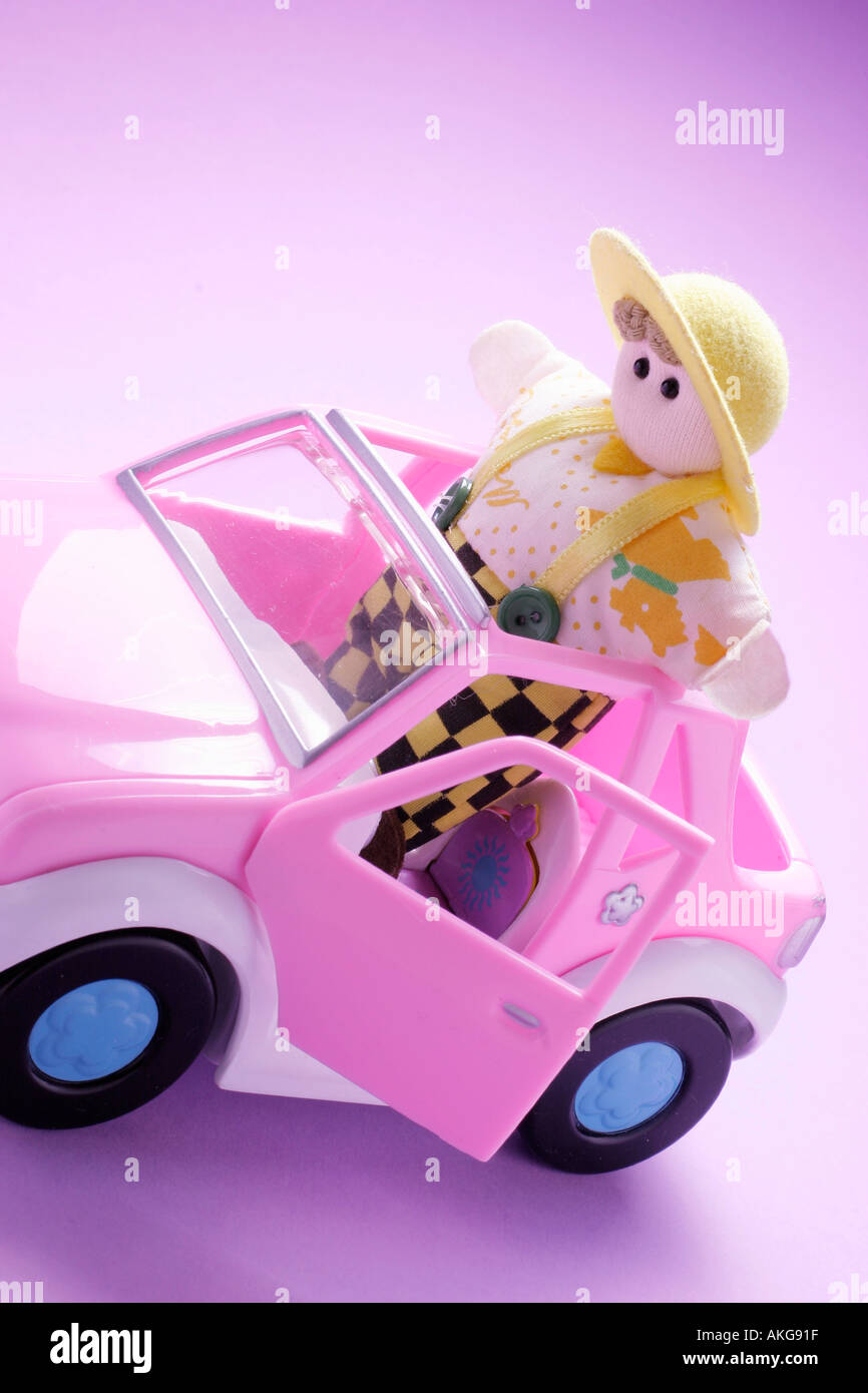 Doll in Toy Car Stock Photo - Alamy
