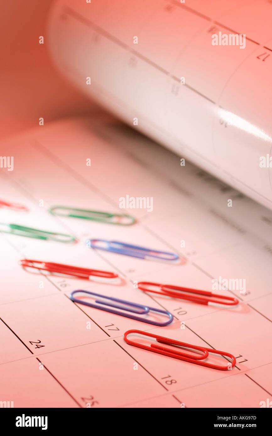Paper Clips on Calendar Stock Photo - Alamy