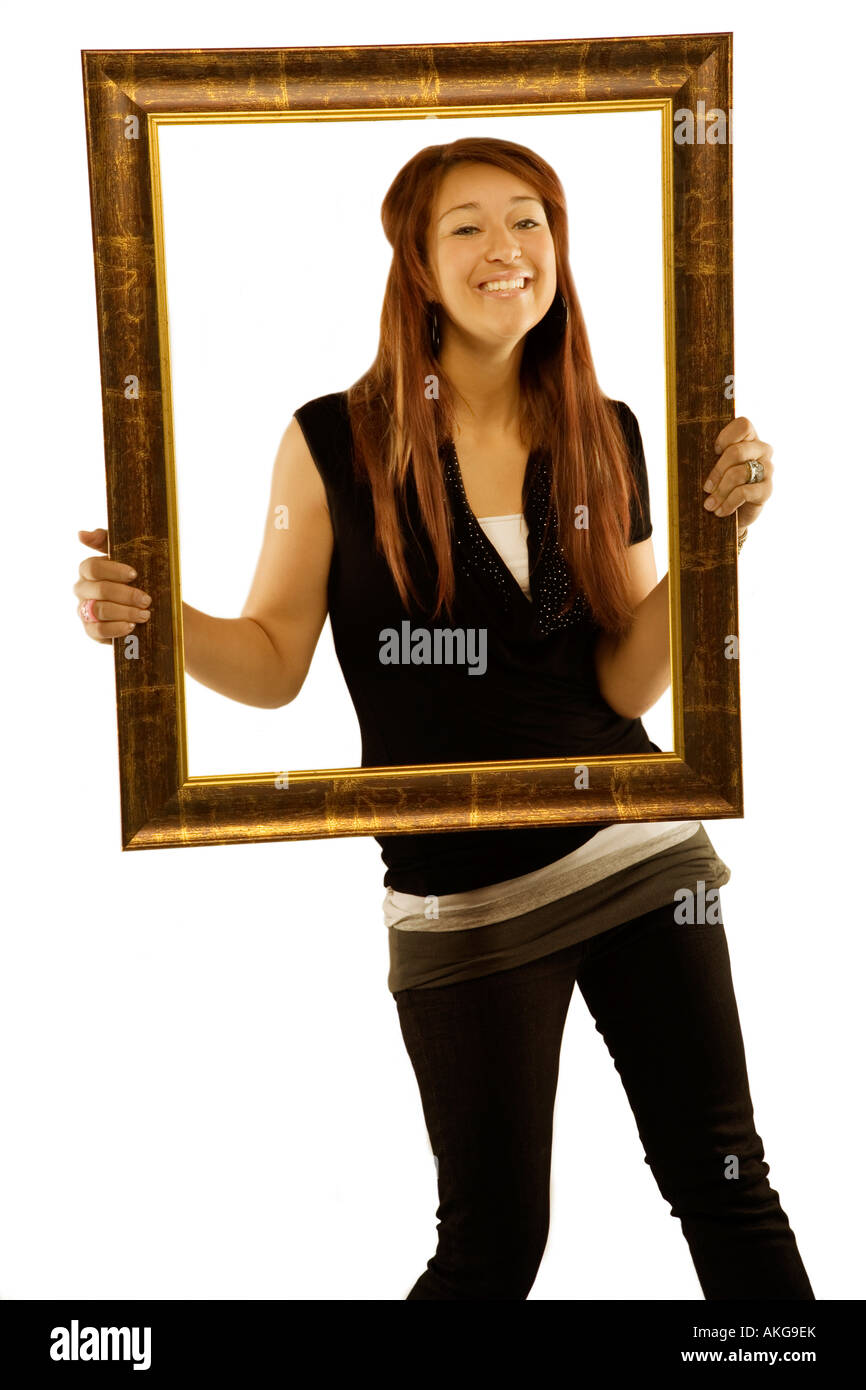 Woman posing with picture frame Stock Photo - Alamy