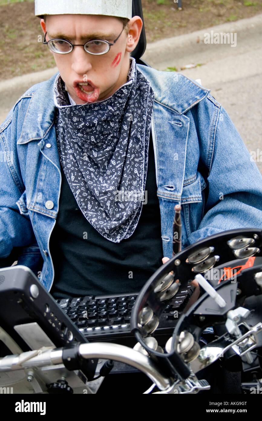 Physically challenged parade participant communicating with computer ...