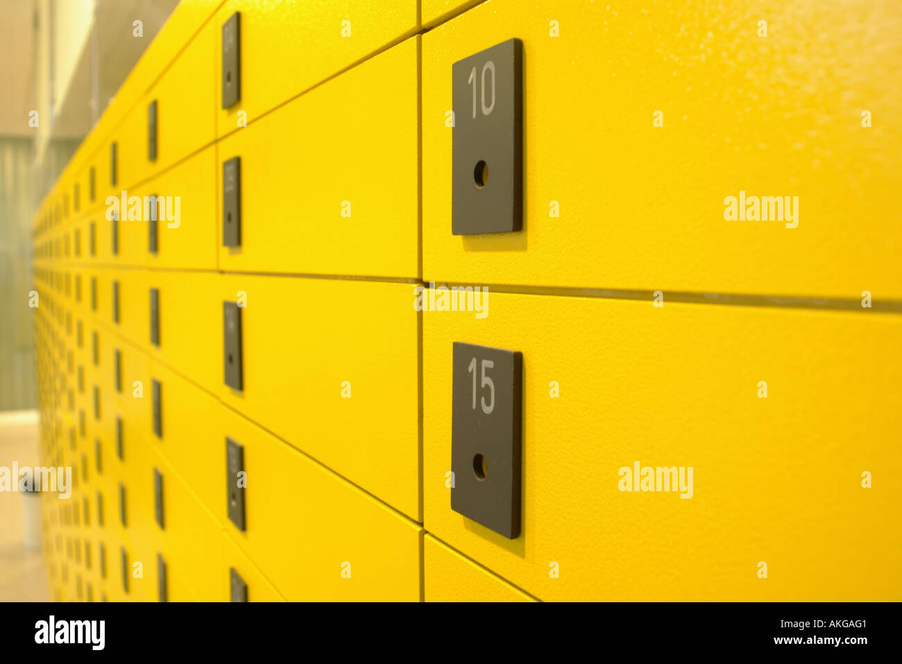 yellow lock boxes very shallow DOF Stock Photo - Alamy