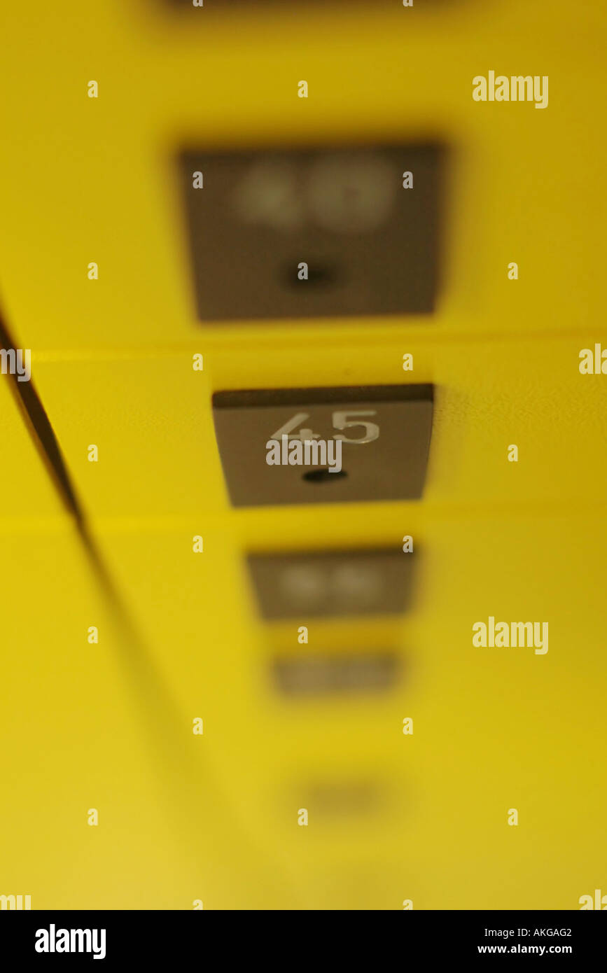 yellow lock boxes very shallow DOF Stock Photo - Alamy