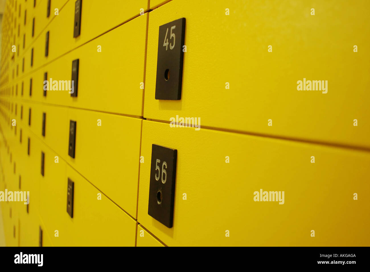 yellow lock boxes very shallow DOF Stock Photo - Alamy