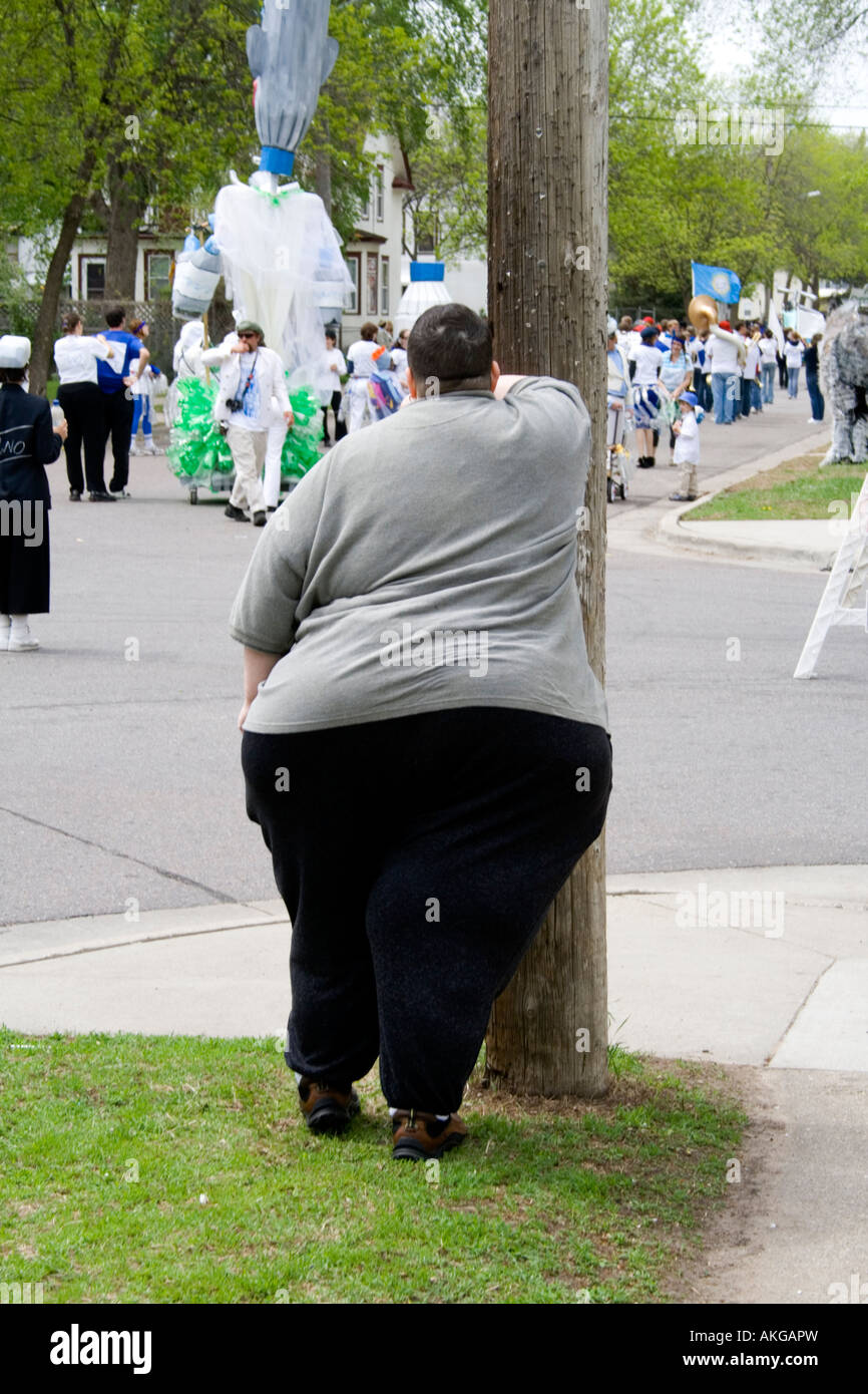 Very overweight man age 22 watching the parade. MayDay Parade and ...