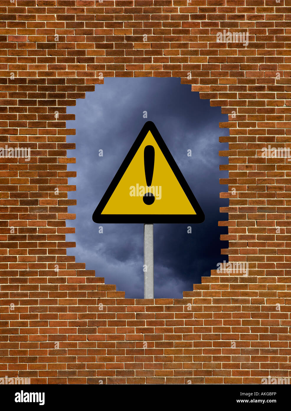 BRICK WALL WITH HOLE SHOWING WARNING SIGN Stock Photo - Alamy