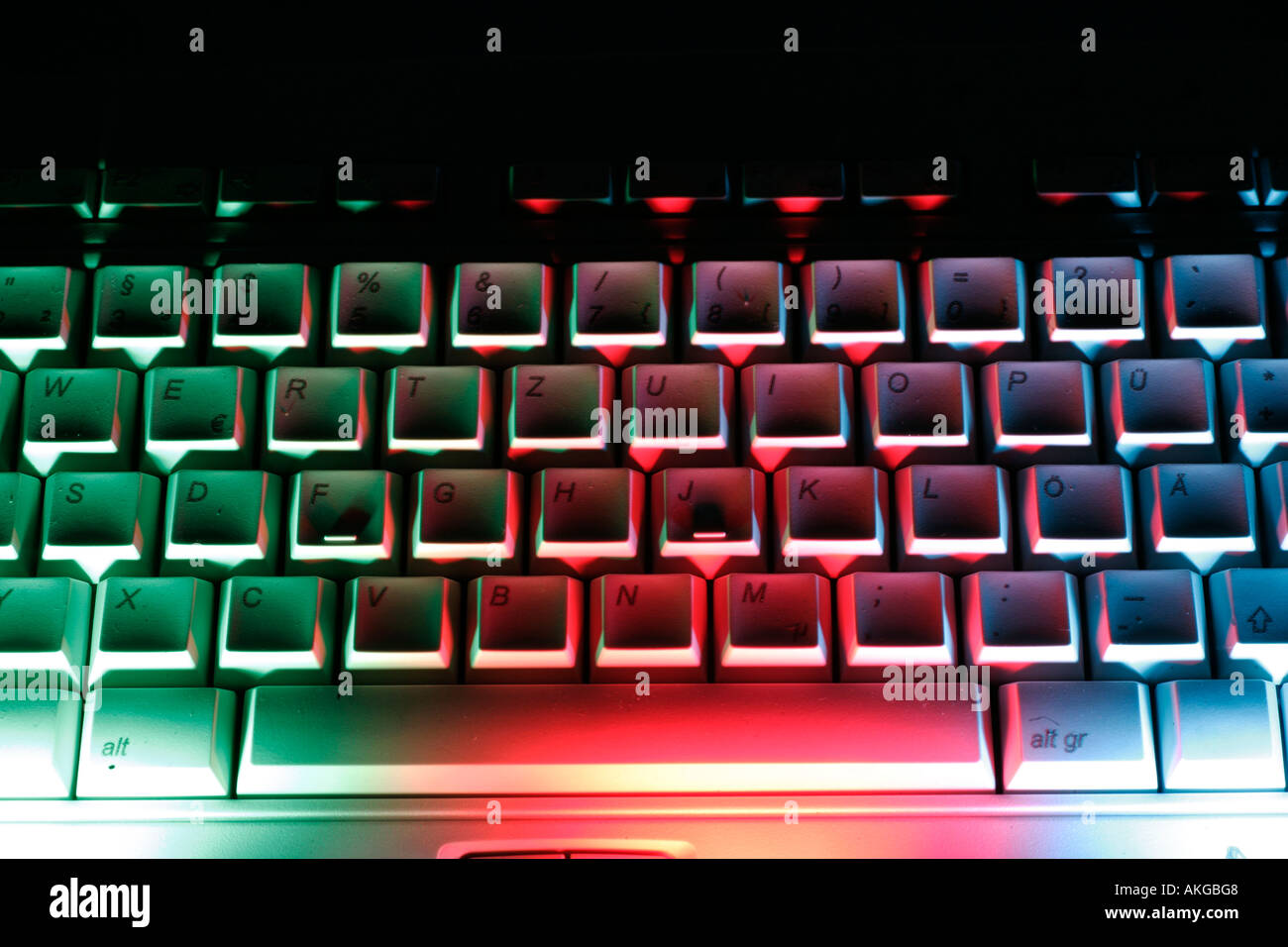 Computer Keyboard in colorful lighting Stock Photo - Alamy