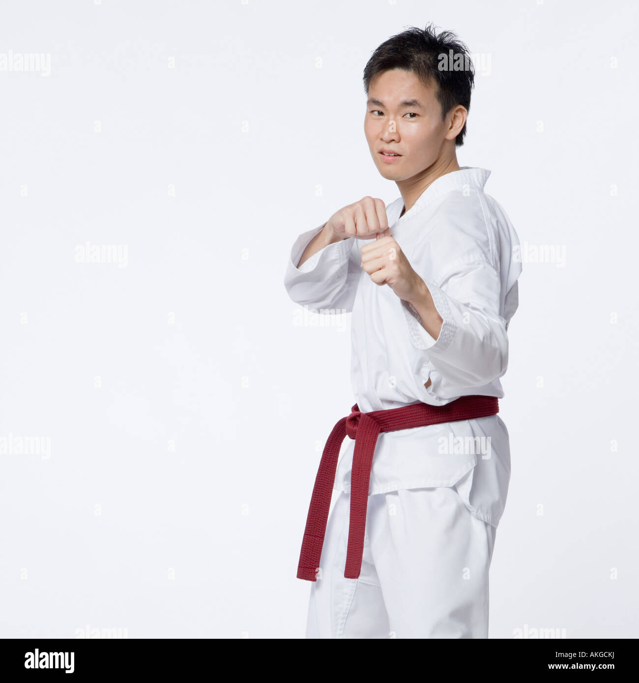 Young man in fighting stance Stock Photo - Alamy
