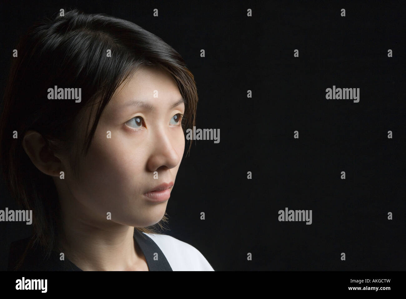 Close-up of a young woman contemplating Stock Photo - Alamy
