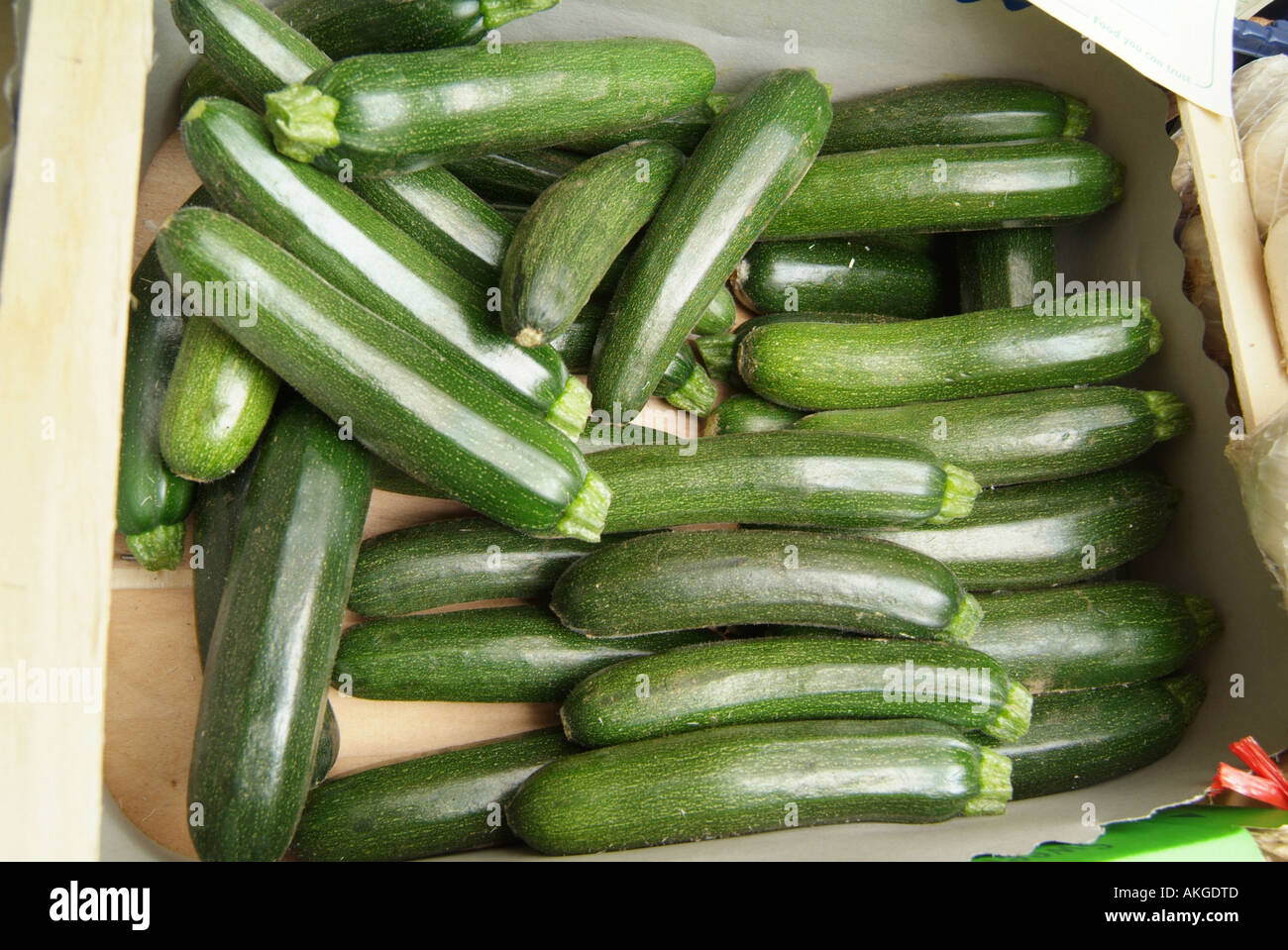 organic courgettes in a crate Stock Photo - Alamy