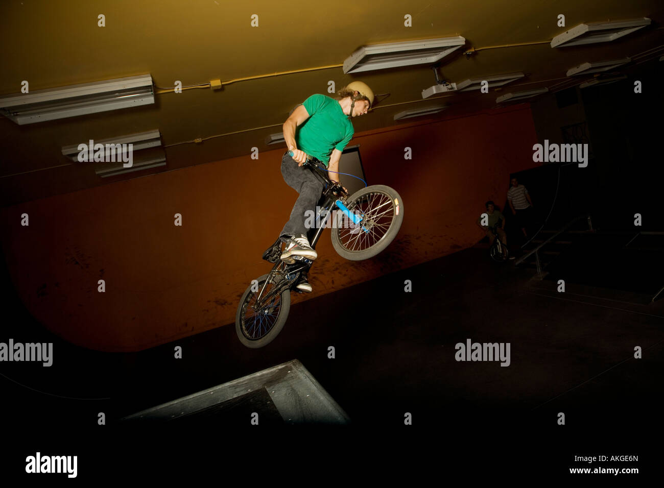 Man doing bicycle stunt Stock Photo - Alamy