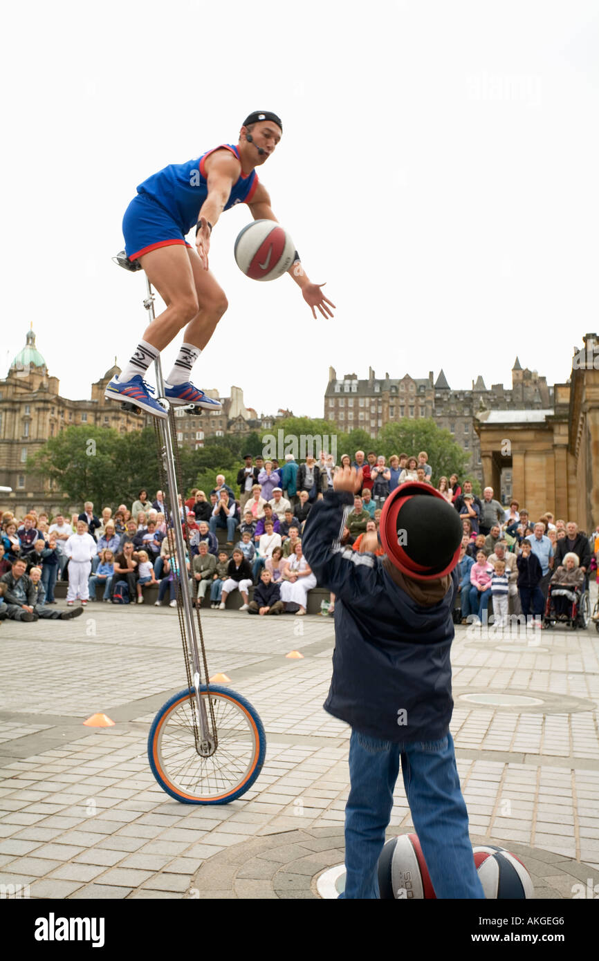 Basketball entertainer riding unicycle at Edinburgh Festival Fringe ...