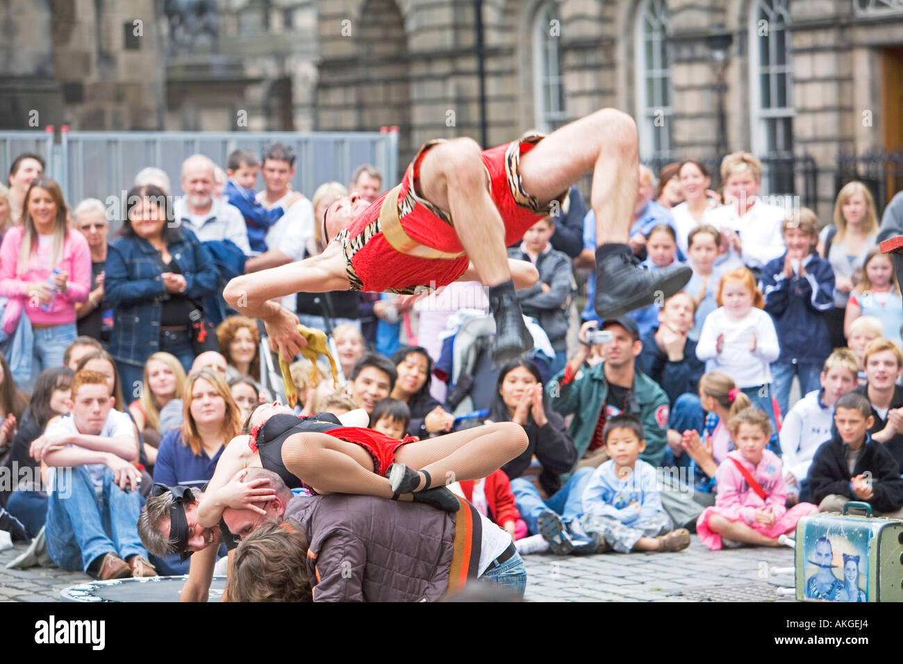 Male acrobat vaults people at Edinburgh Festival Fringe Stock Photo - Alamy