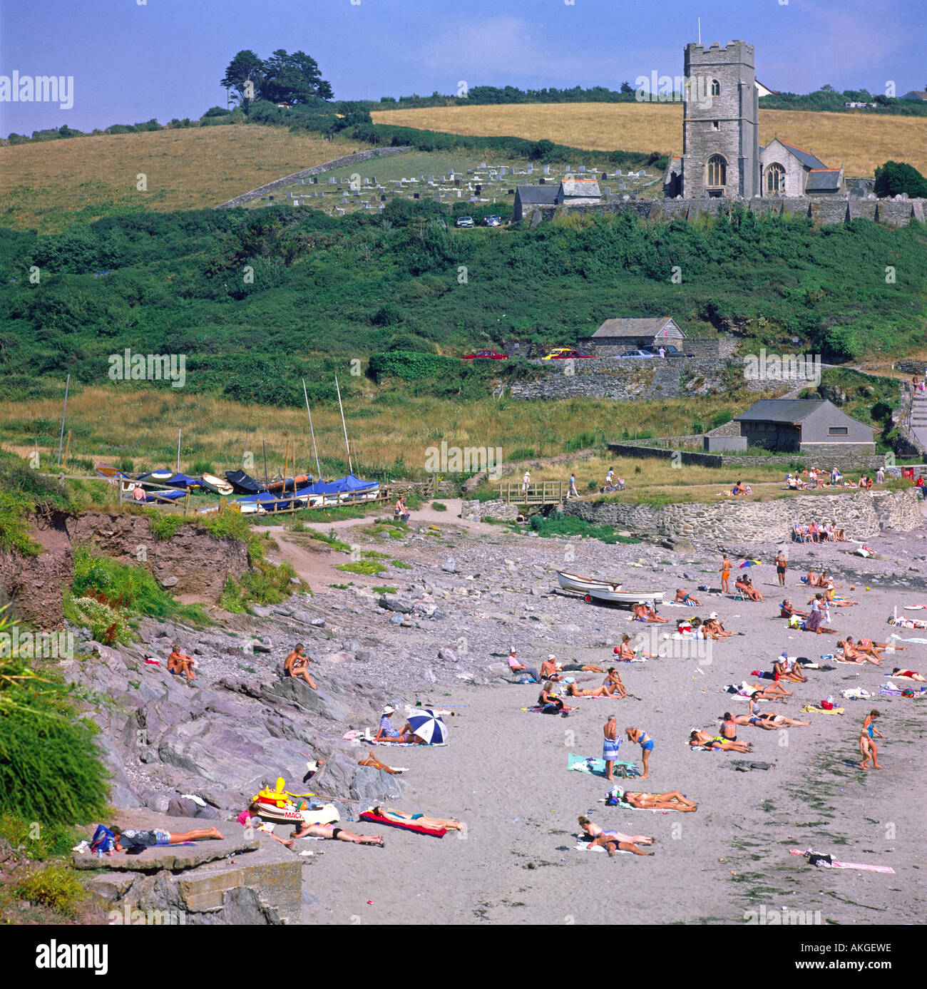 Beach at Wembury Bay, South Devon, England, high summer, with church ...