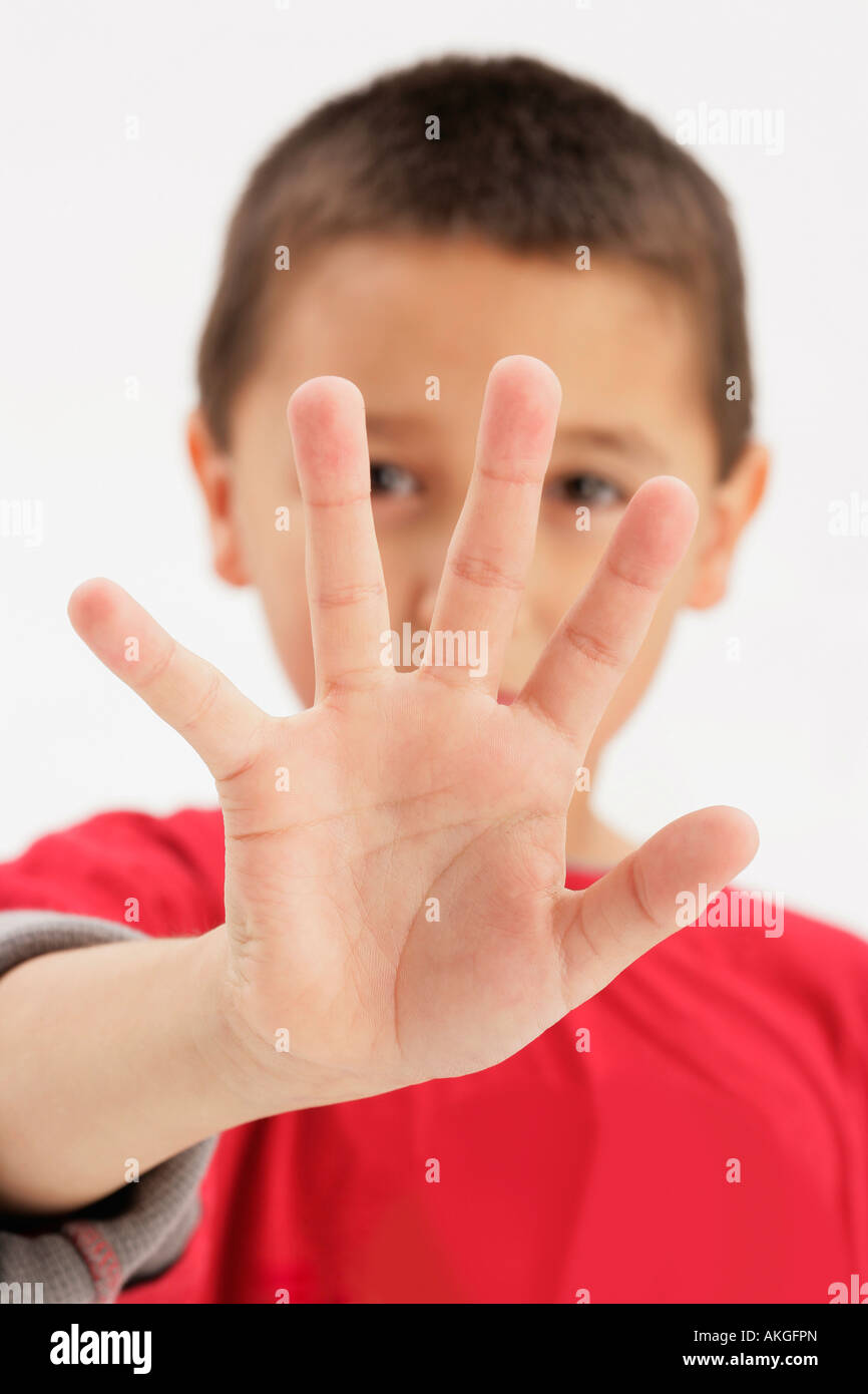 Boy showing hand Stock Photo - Alamy