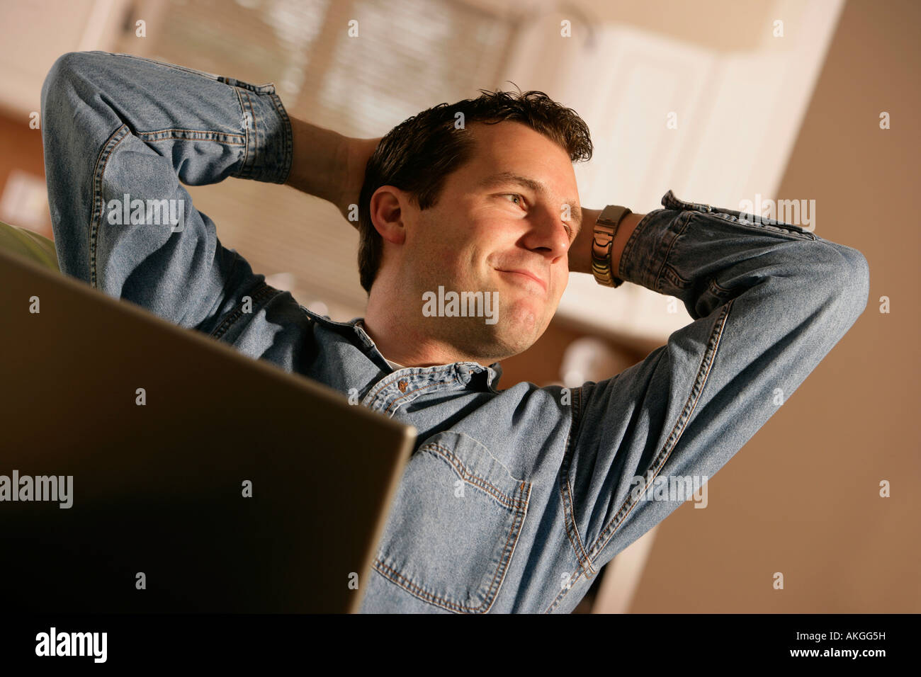 Front view of a man with a laptop Stock Photo - Alamy