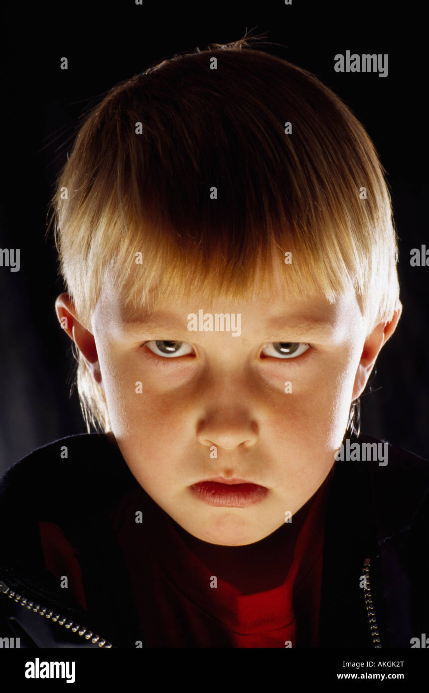 Portrait of angry boy Stock Photo - Alamy