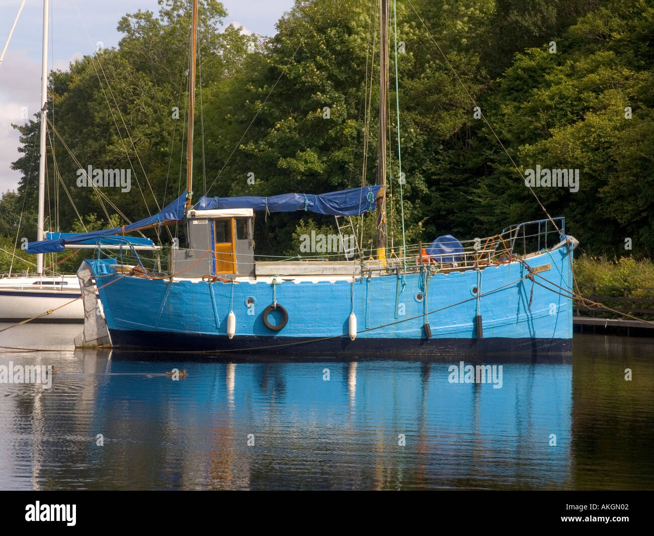 Blue boat at the Bellanoch basin Crinan canal Argyll Scotland Stock ...