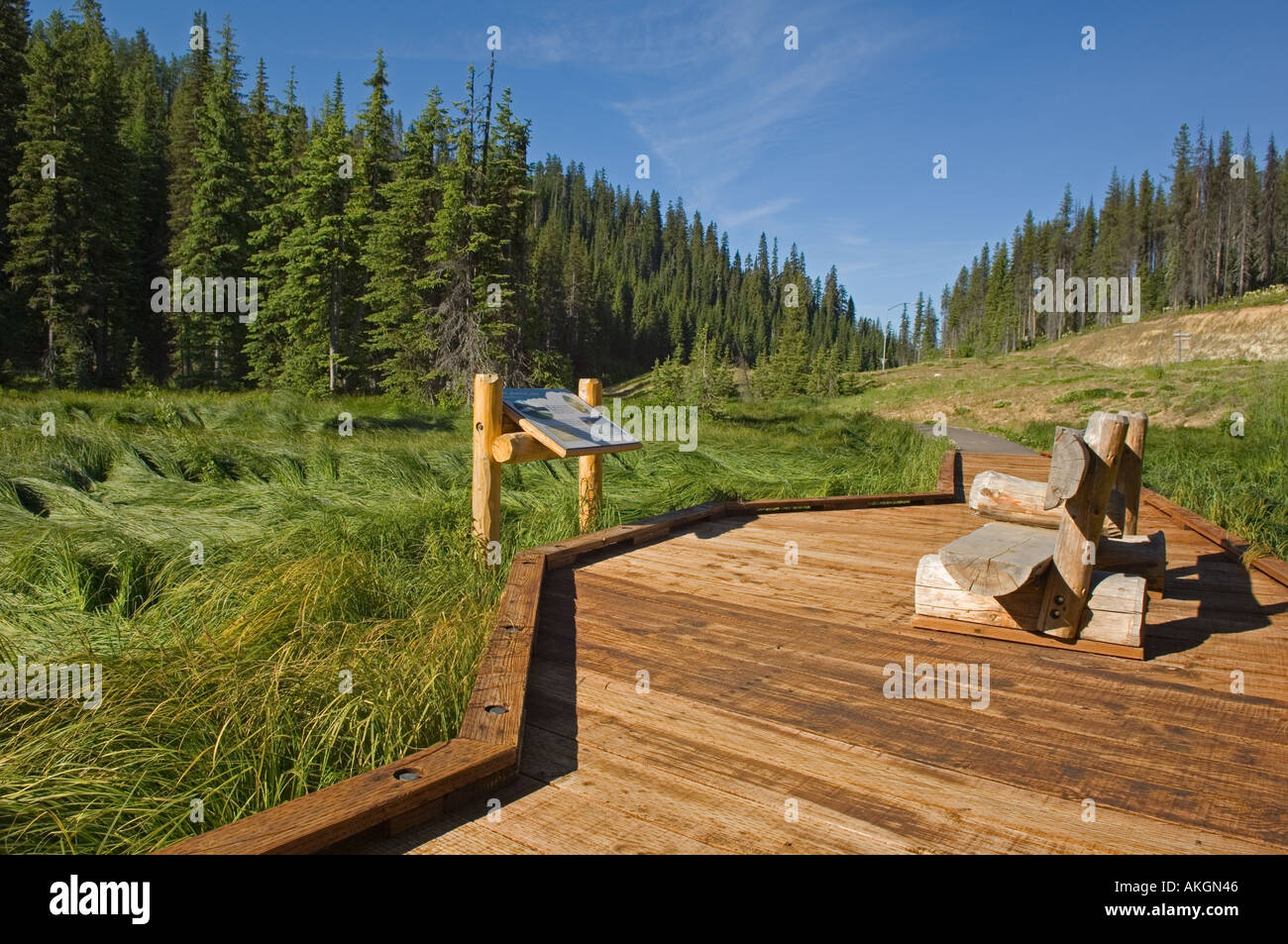 Lolo Pass Visitor Center boardwalk sign and bench on interpretive trail ...