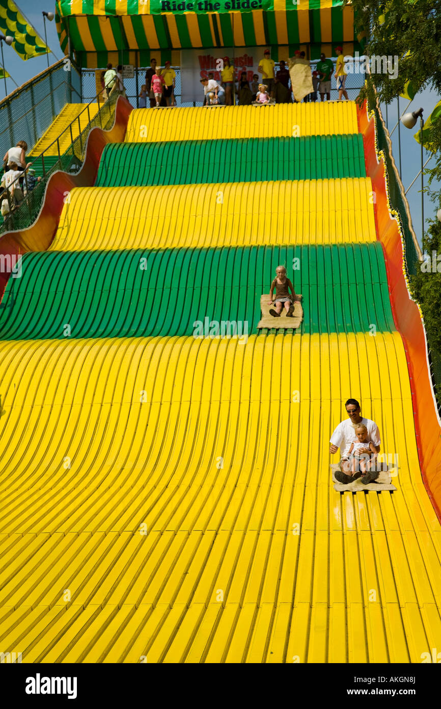 WISCONSIN Milwaukee Children and adults ride burlap sacks down giant ...