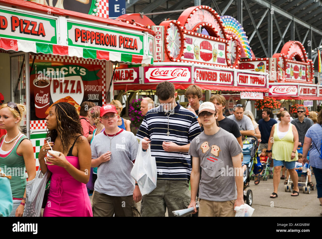 WISCONSIN Milwaukee Crowd of people walk past fast food booths at State ...