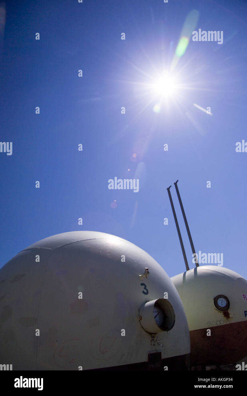 natural gass tanks in sun energy lng clean polution burning propane gas ...